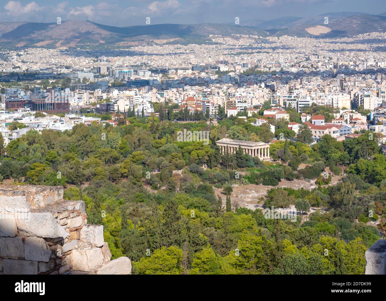 View of the Temple of Hephaestus among the greenery and the buildings ...