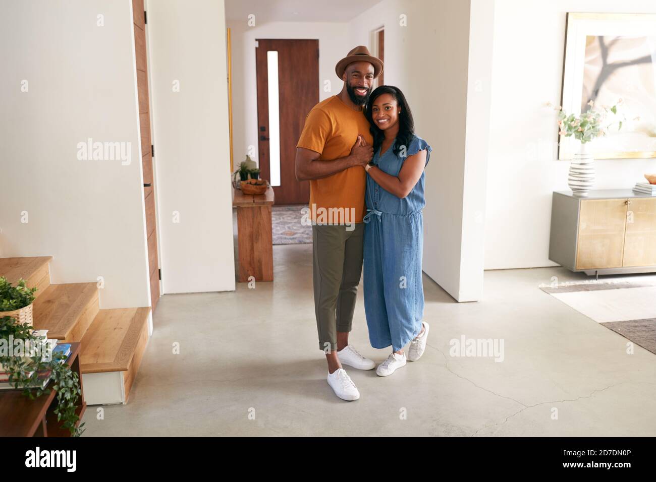 Loving couple hugging talking family hi-res stock photography and ...