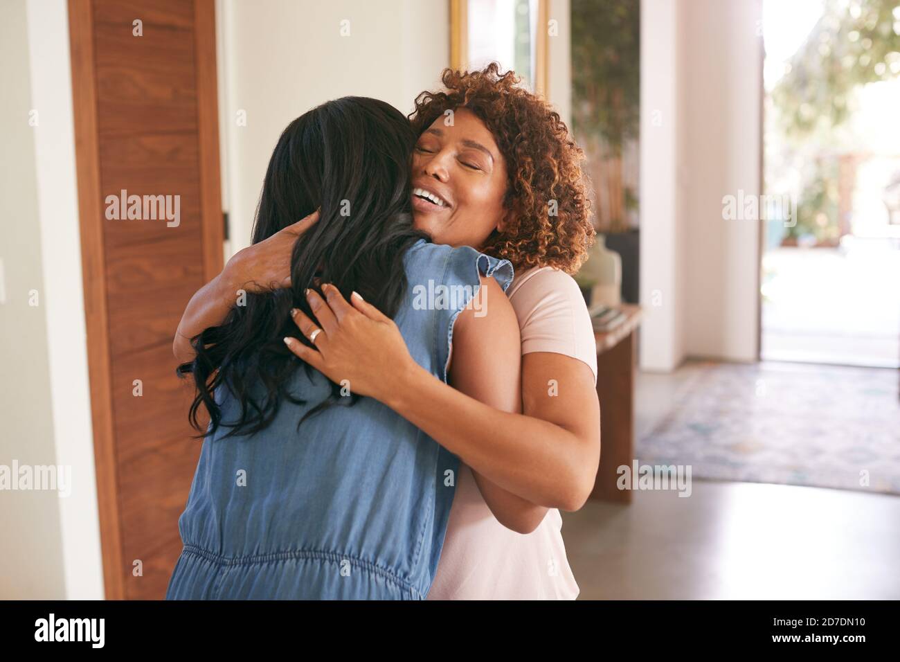 Loving Senior Mother Hugging Adult Daughter Indoors At Home Stock Photo ...