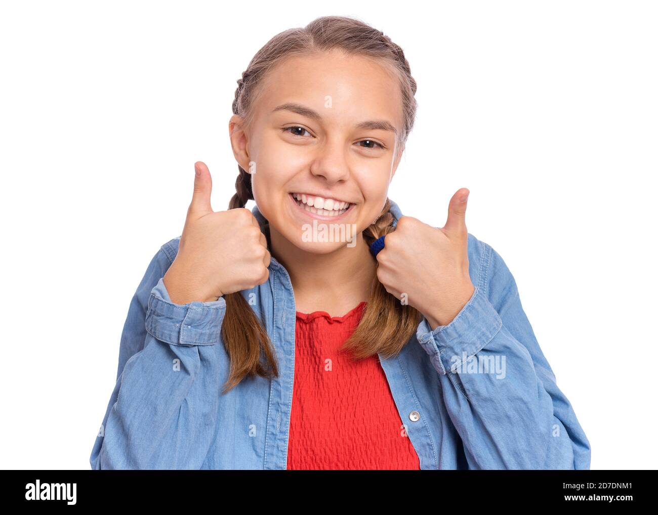 Happy teenage girl pointing up, gesturing idea or doing number one ...