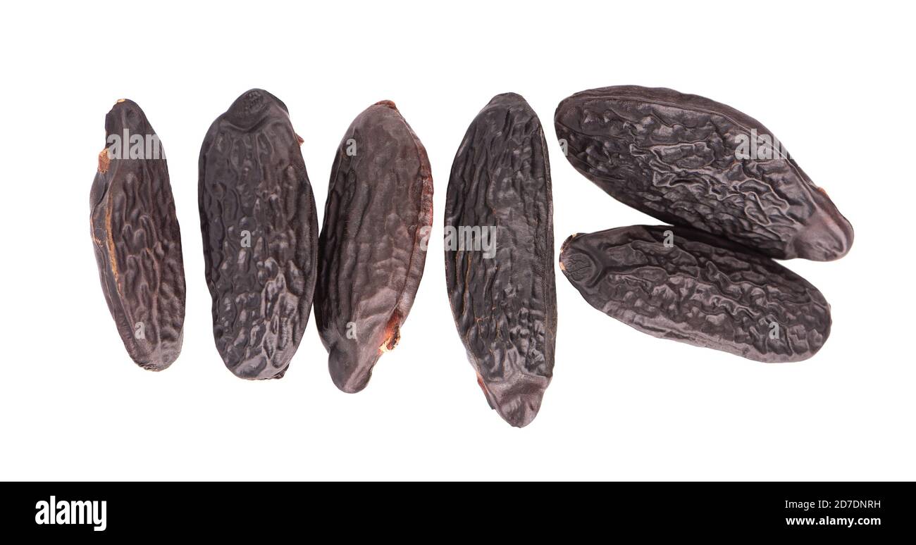 Tonka beans isolated on white background. Bean of Dipteryx odorata ...