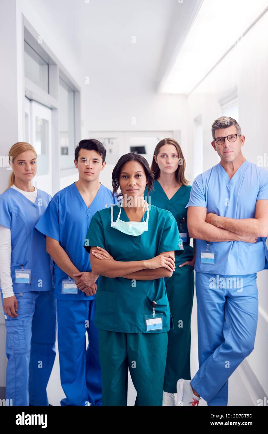 Multicultural Medical Team Having Meeting In Hospital Corridor Stock