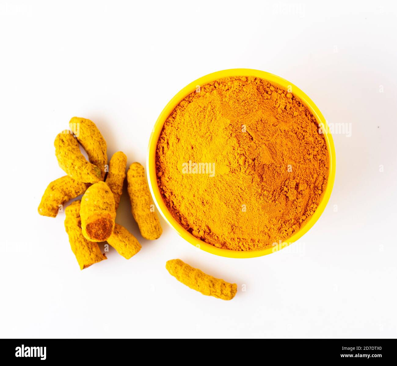 Indian spices turmeric roots and powder on white background Stock Photo ...
