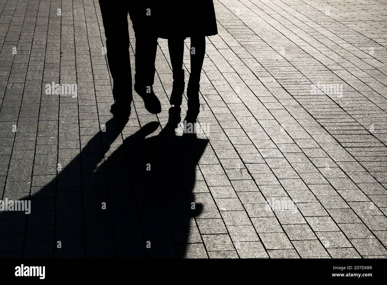 Shadows people walking on pavement hi-res stock photography and images ...