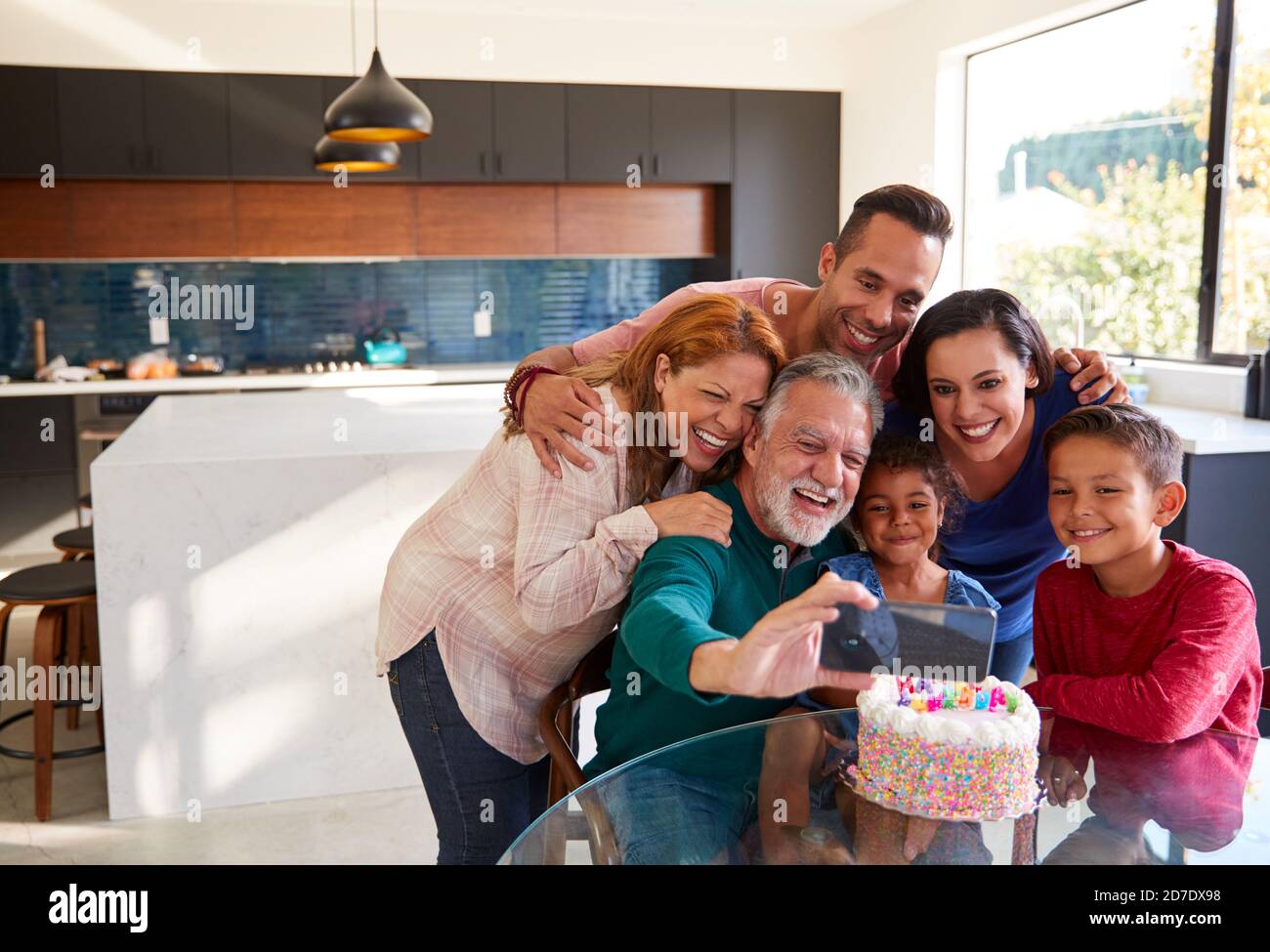 Multi-Generation Hispanic Family Taking Selfie To Celebrate ...