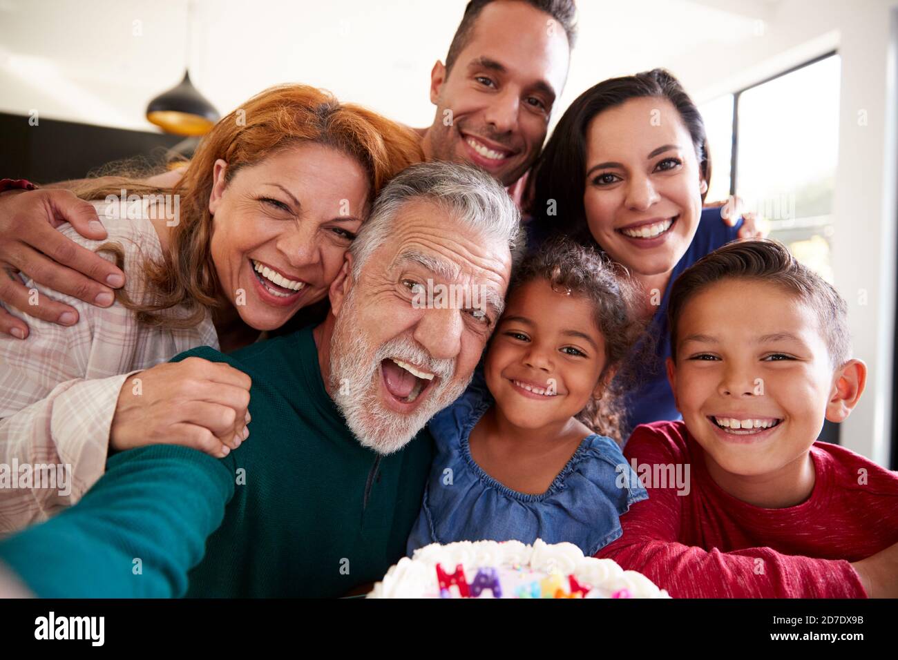 Multi-Generation Hispanic Family Taking Selfie To Celebrate ...