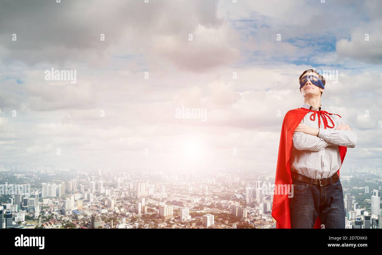 Confident super hero Stock Photo - Alamy