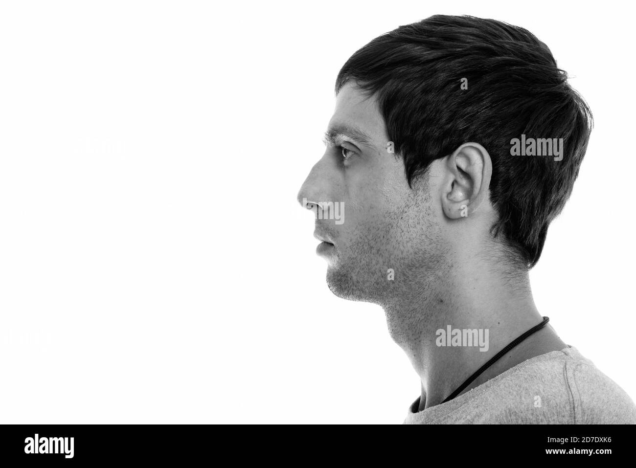 Close up profile view of young handsome man Stock Photo - Alamy