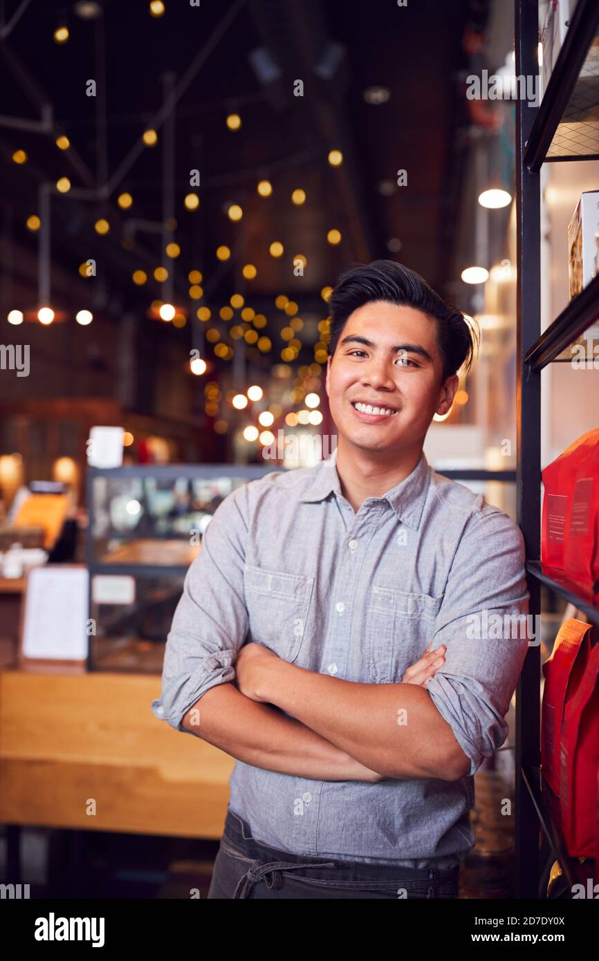 Portrait Of Male Coffee Shop Owner Standing By Counter Stock Photo - Alamy