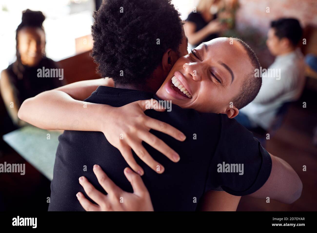 Men hug greeting hi-res stock photography and images - Alamy