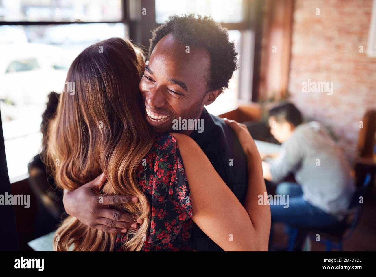 Men hug greeting hi-res stock photography and images - Alamy
