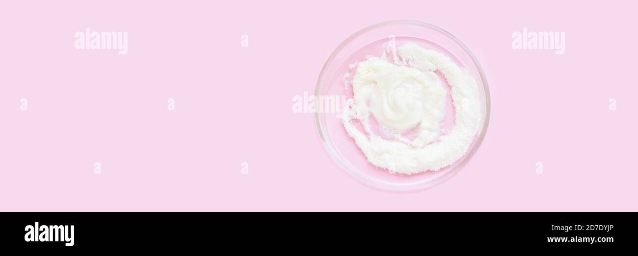 Collagen white powder. Pastel color background. Health product Stock ...