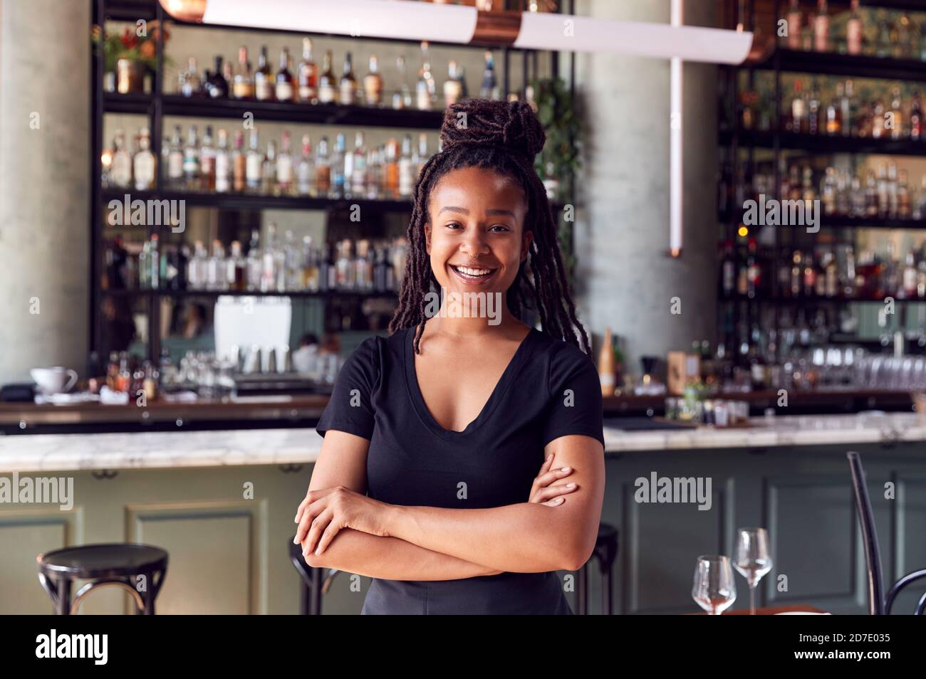 Girl standing bar counter High Resolution Stock Photography and Images ...