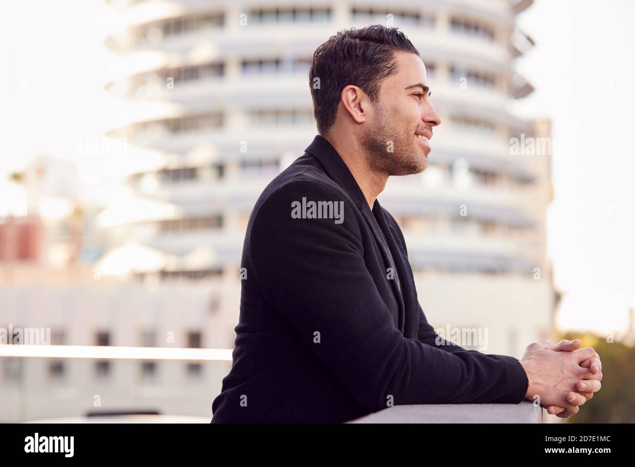 Profile Shot Of Businessman Standing Outside Office Building With City ...