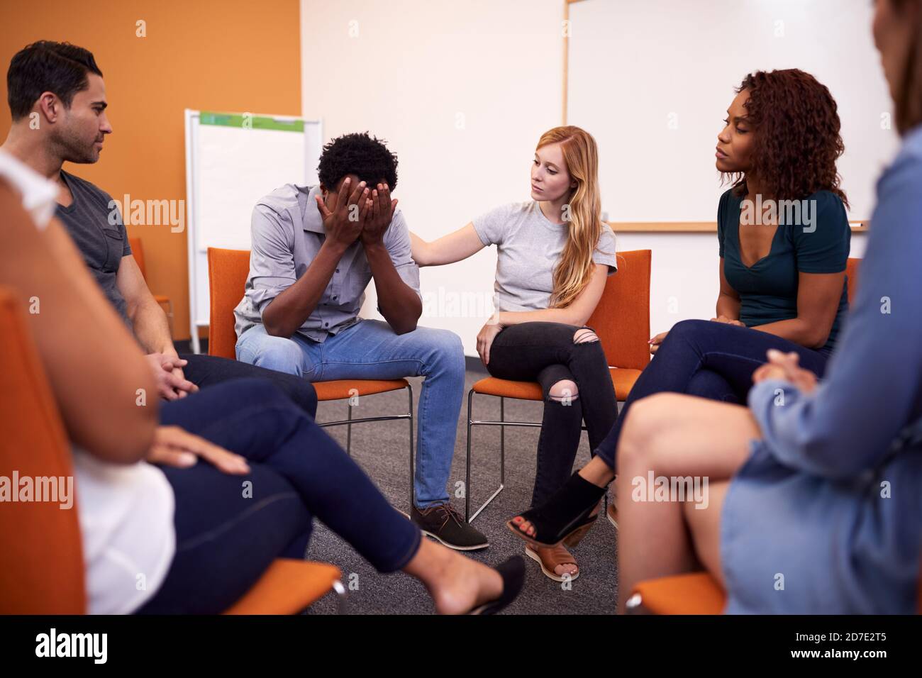 Multi-Cultural Group Of Men And Women At Mental Health Group Therapy ...