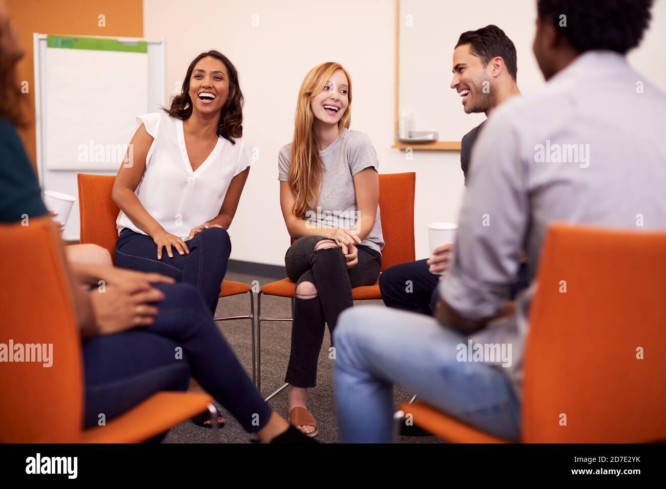 Multi-Cultural Group Of Men And Women At Mental Health Group Therapy ...