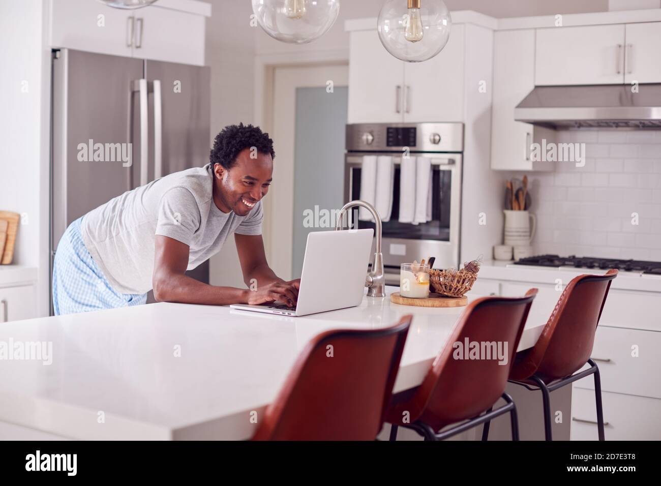 Wearing pyjamas while working at home hi-res stock photography and ...