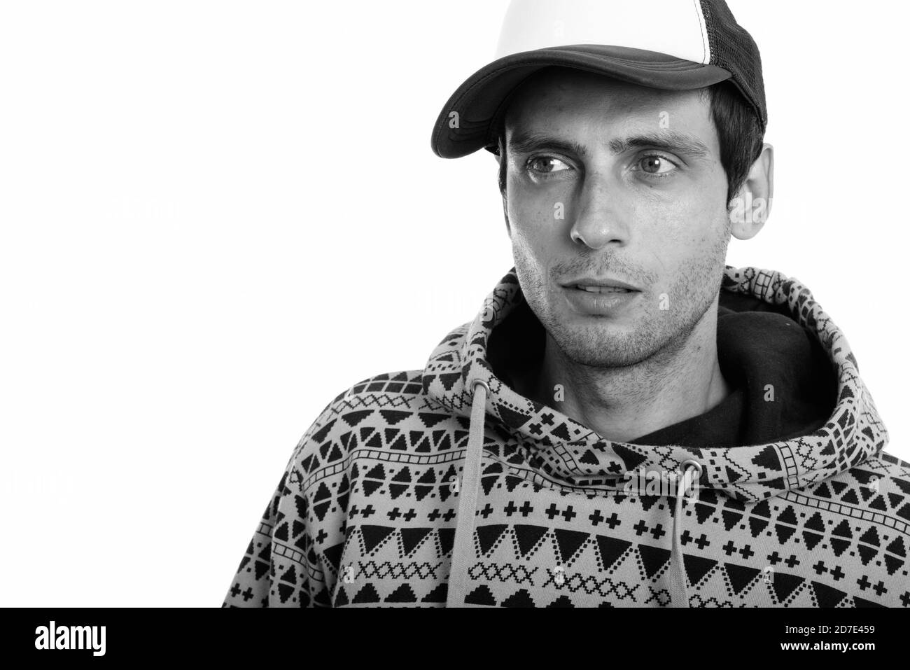 Thoughtful young man wearing cap hi-res stock photography and images ...