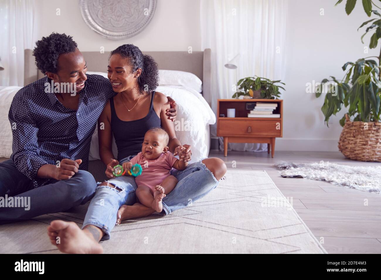 African american baby sitting on floor hi-res stock photography and images - Alamy