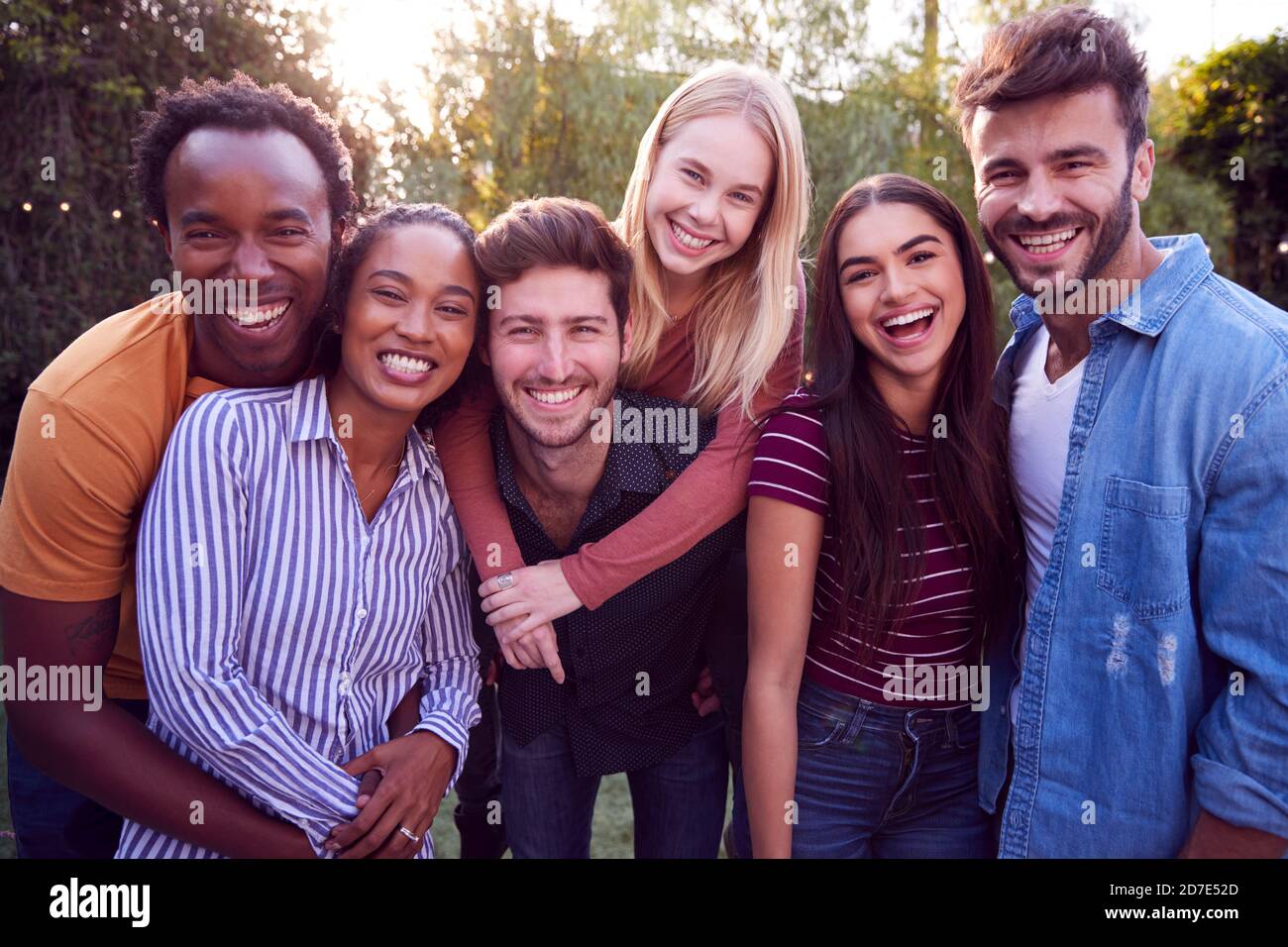 Portrait Of Group Of Multi-Cultural Friends Enjoying Outdoor Summer ...