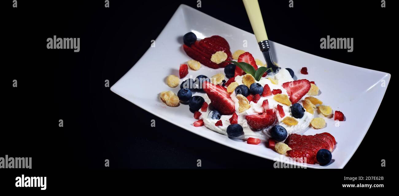 Curd dessert with fresh berries for breakfast Stock Photo - Alamy