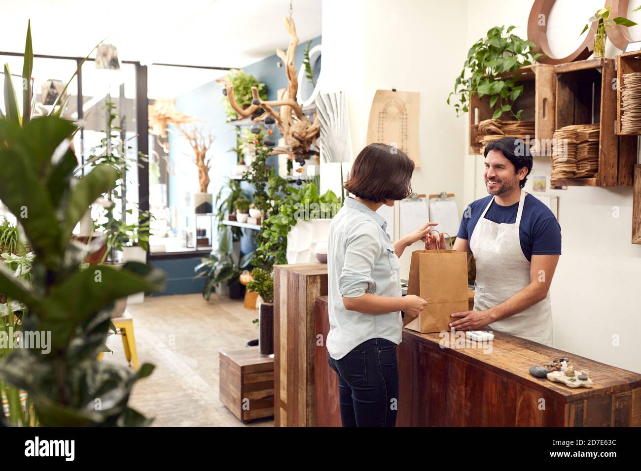 Male sales assistant male customer hi-res stock photography and images ...