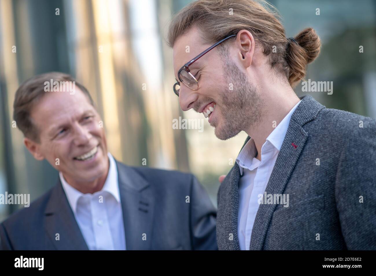 Two involved male colleagues discussing business issues outside Stock ...