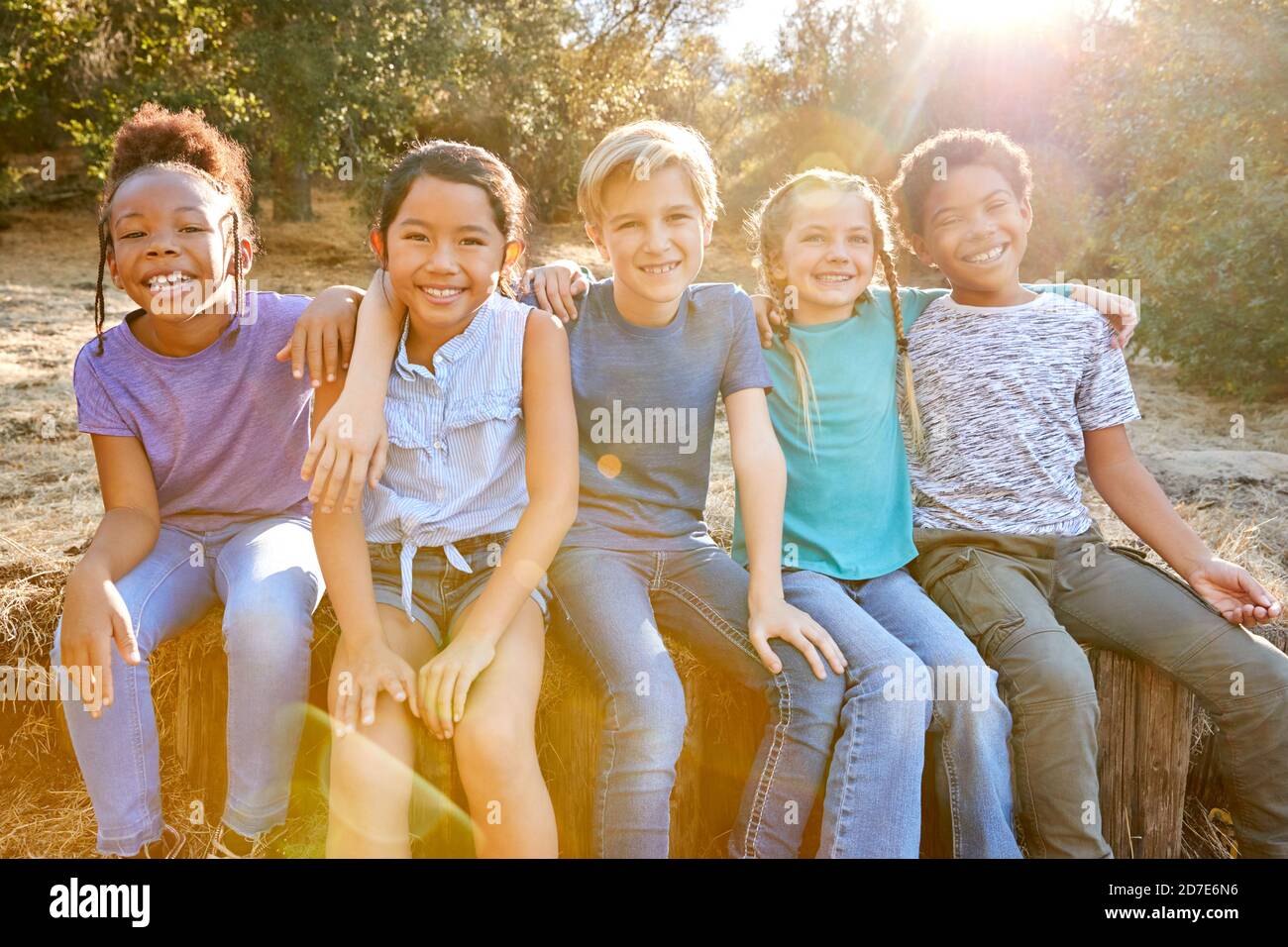 Portrait Of Multi-Cultural Children Hanging Out With Friends In ...