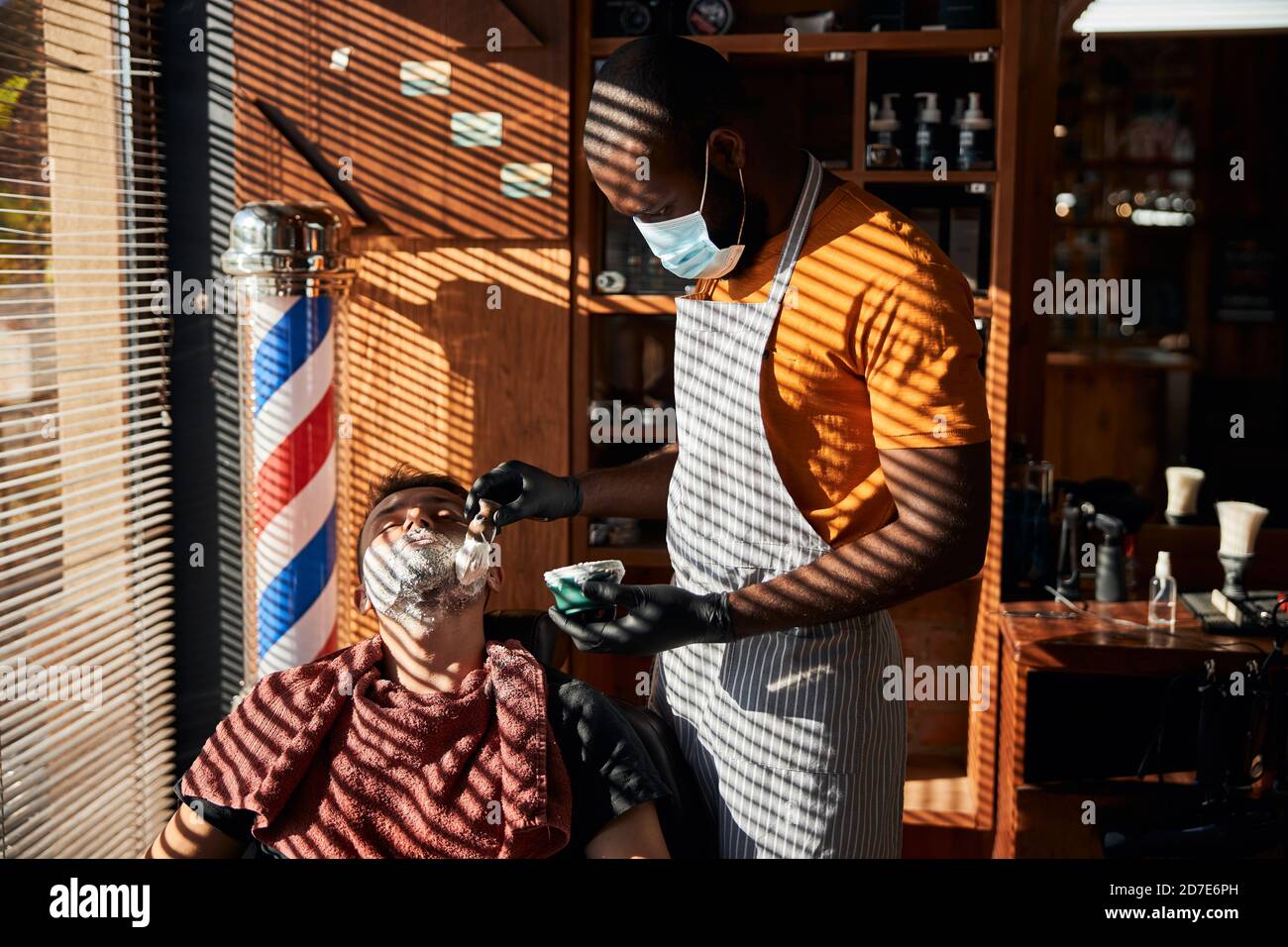 Man apply cream hair hi-res stock photography and images - Alamy