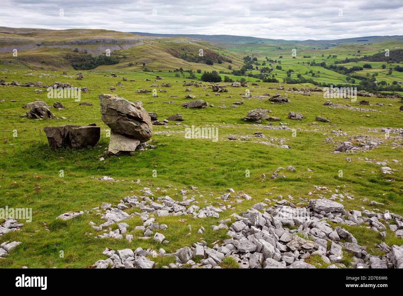 The Norber Erratics, boulders of Silurian greywacke rock, perched on ...