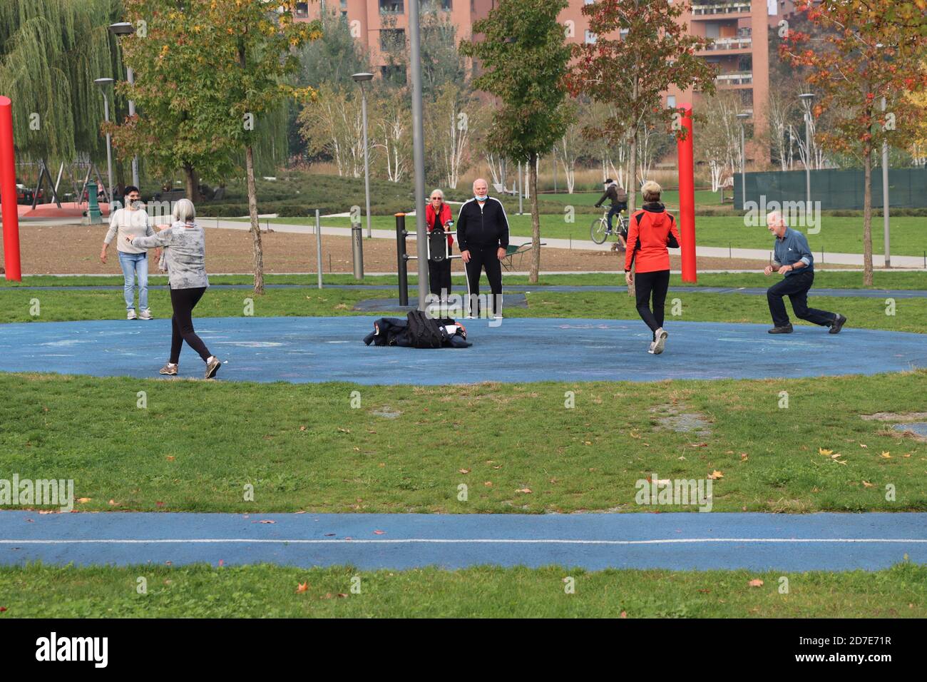 Fitness class in a public park, Milan, Italy Stock Photo - Alamy