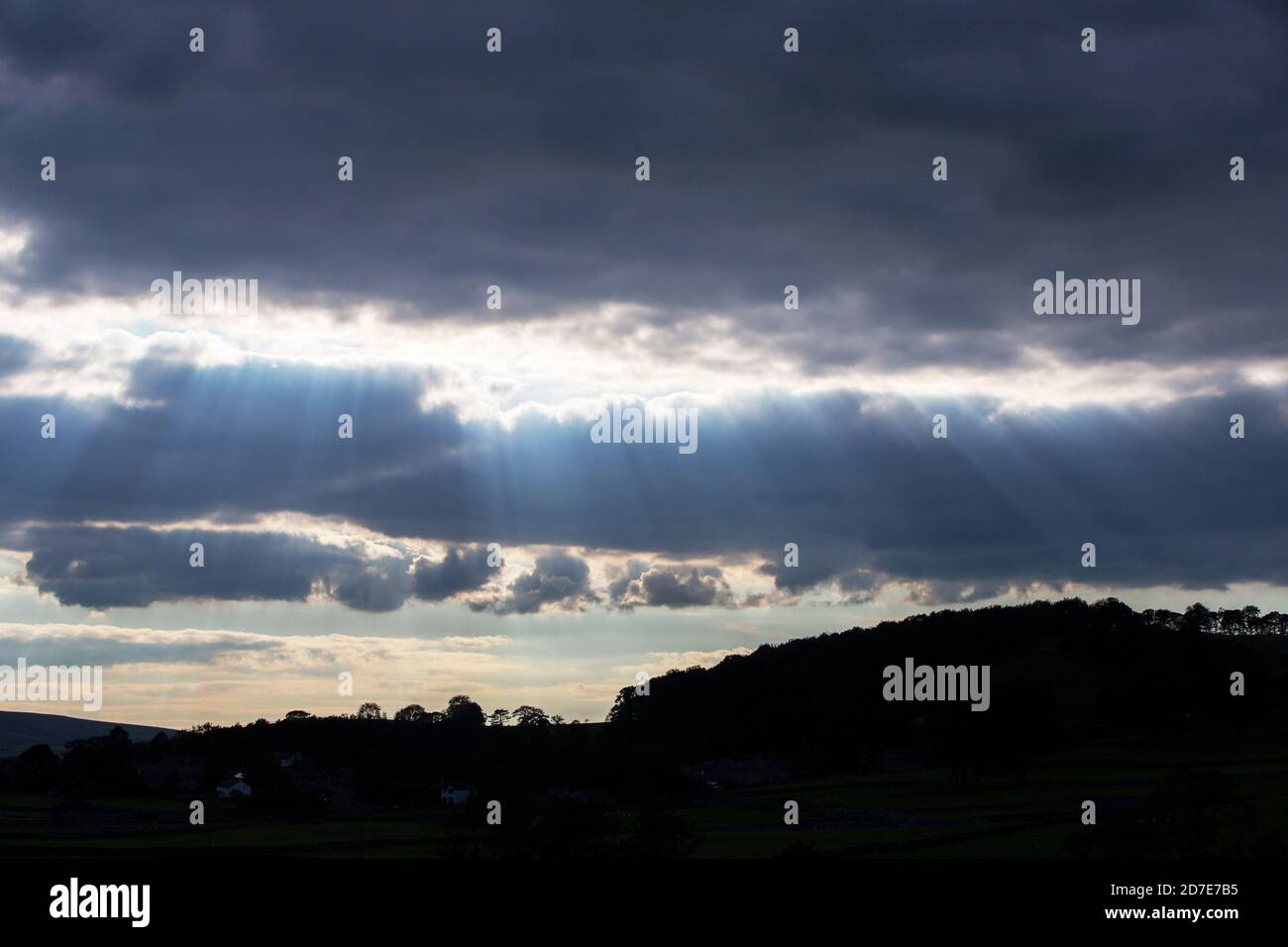 Shafts of sunlight over Austwick, Yorkshire Dales, UK Stock Photo - Alamy