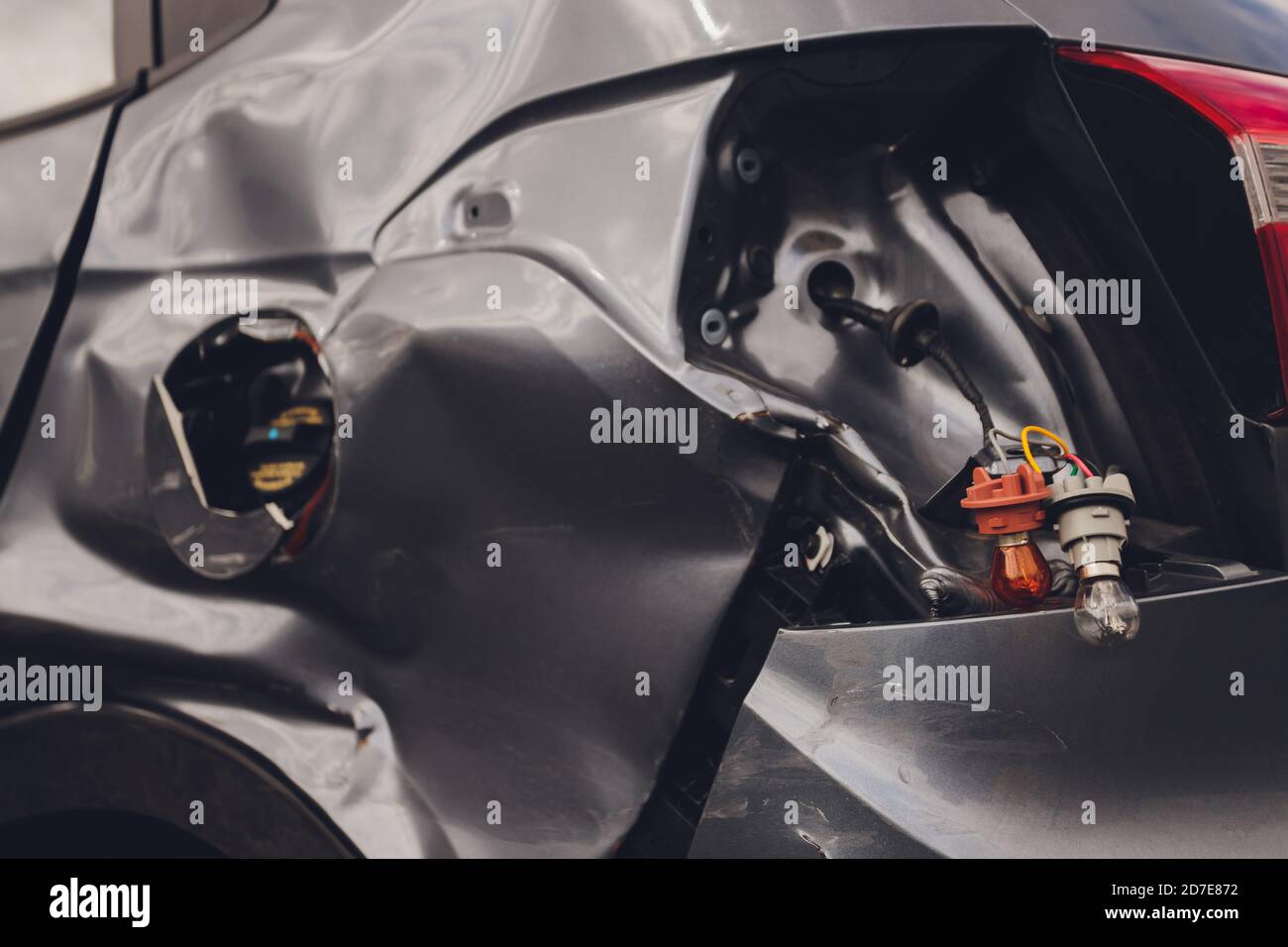 car has dented rear bumper damaged after accident Stock Photo - Alamy