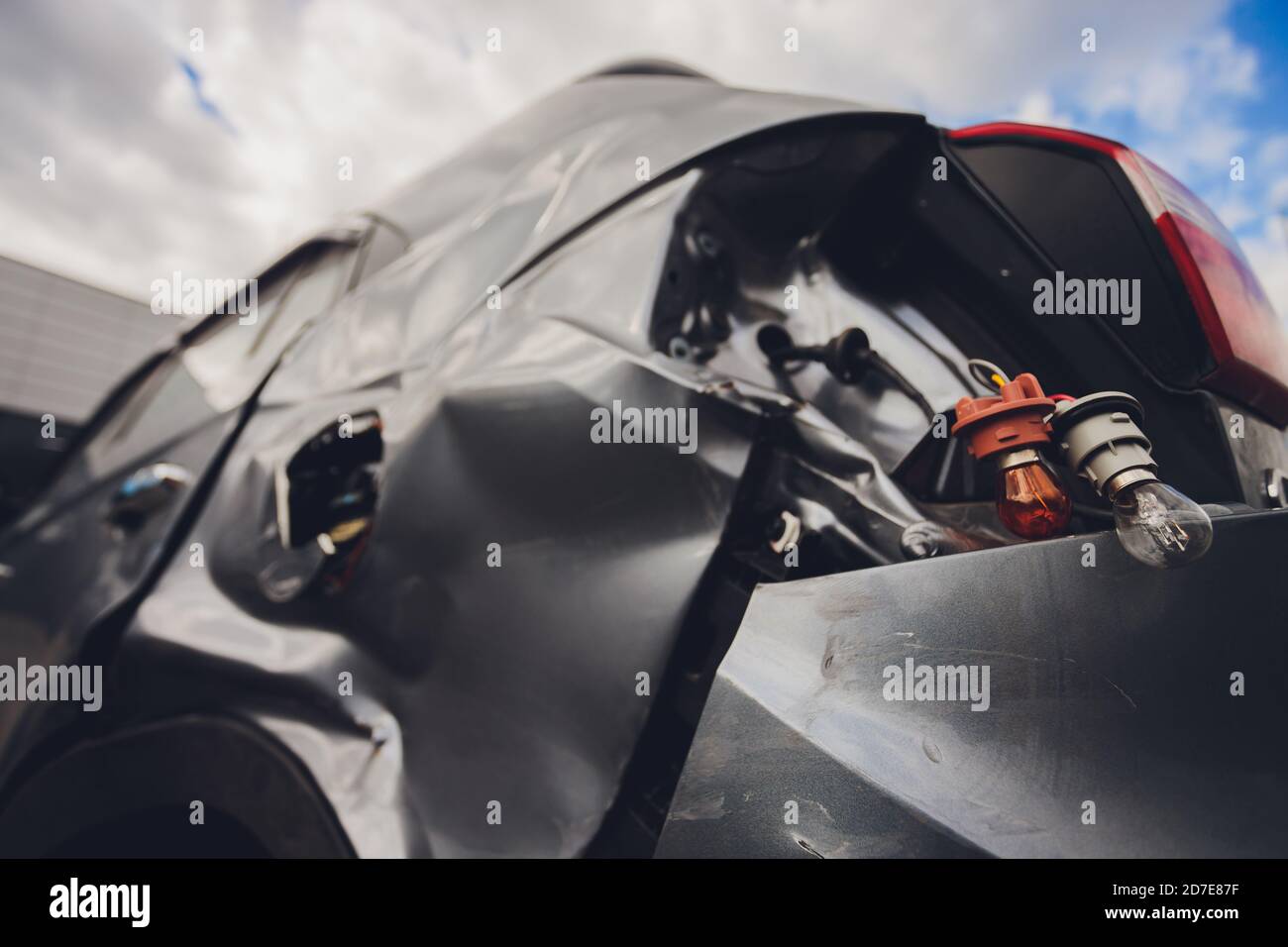 car has dented rear bumper damaged after accident Stock Photo - Alamy