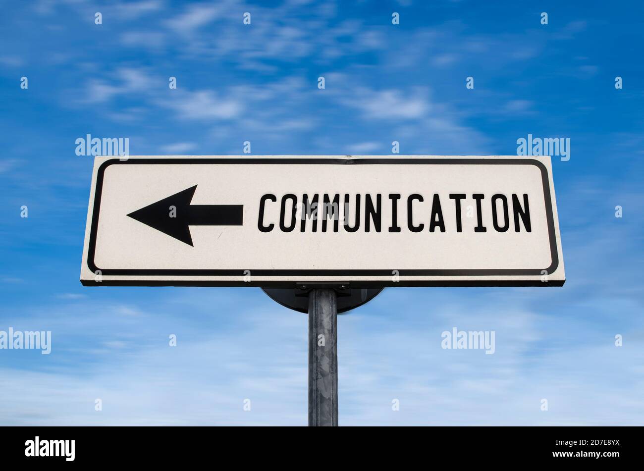 Communication road sign, arrow on blue sky background. One way blank ...