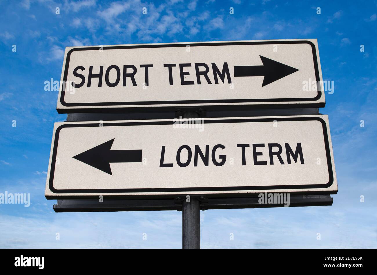 Short term road sign, arrow on blue sky background. One way blank road ...