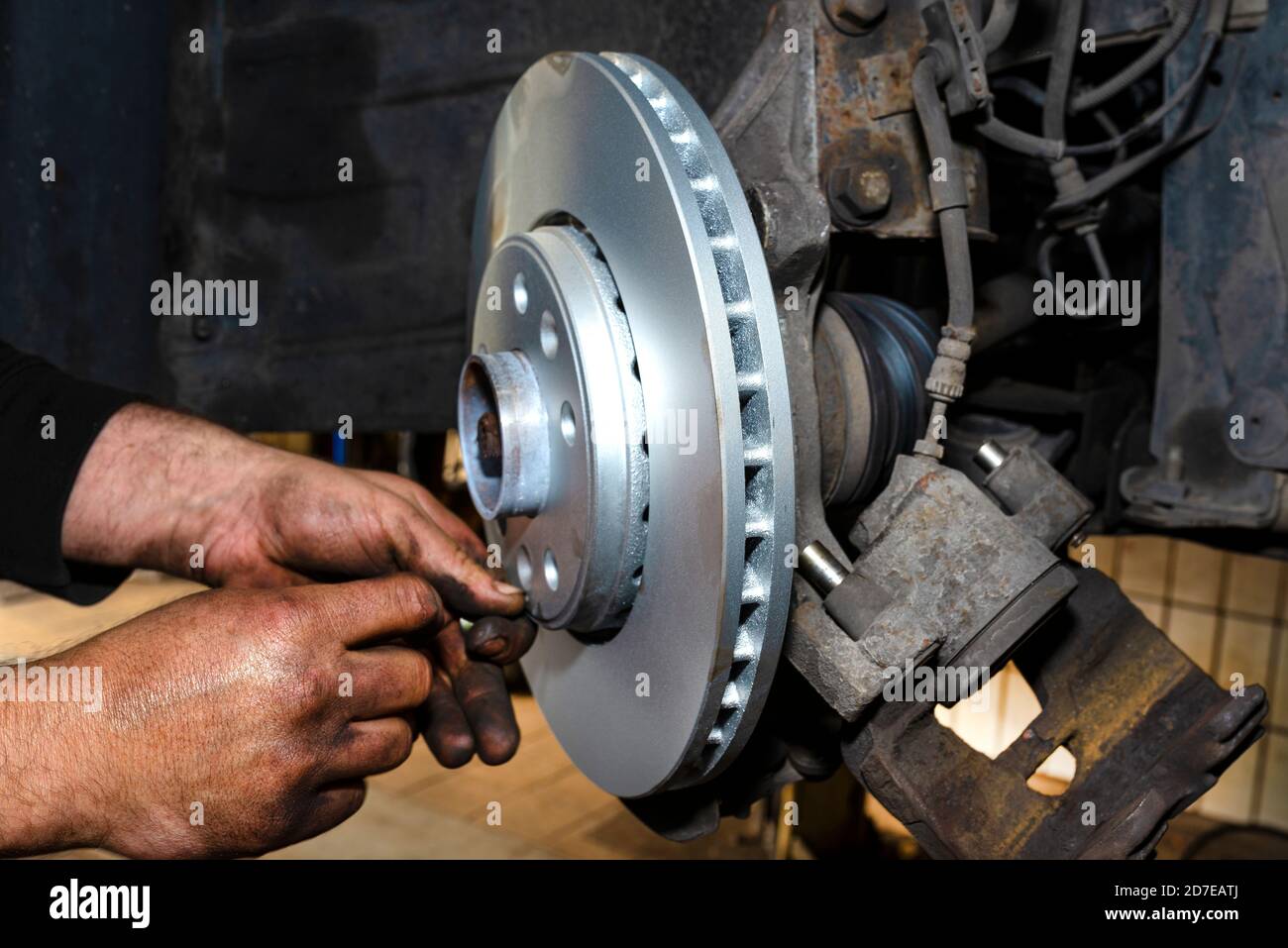 New brake disc with an anti-corrosion layer, mounted on the front hub ...