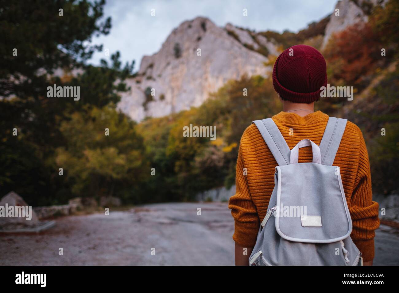 Outdoor fashion photo of young beautiful asian lady surrounded autumn ...
