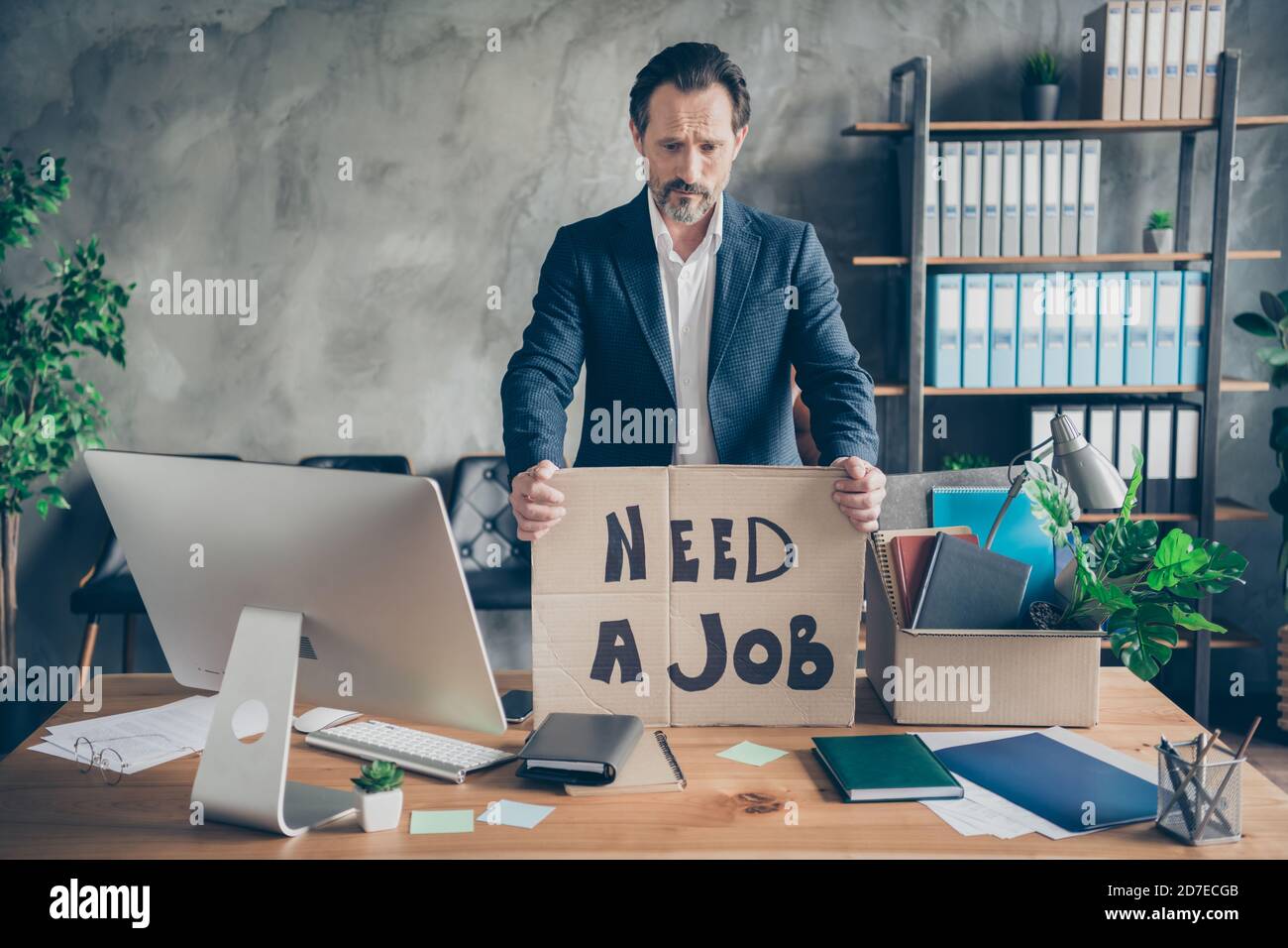 Photo of sad layoff dismissed worker mature age jobless guy carton ...