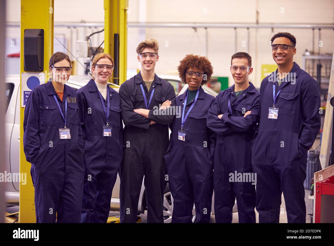 Portrait Of Students Studying For Auto Mechanic Apprenticeship At ...