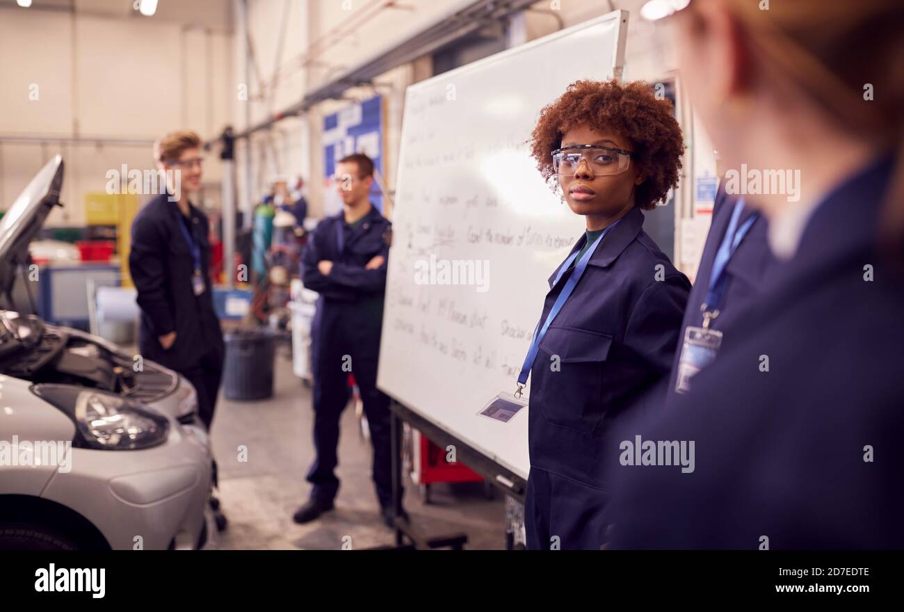 Students Studying For Auto Mechanic Apprenticeship At College Standing ...