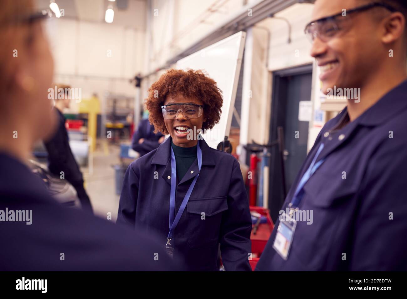 Students Studying For Auto Mechanic Apprenticeship At College Standing ...