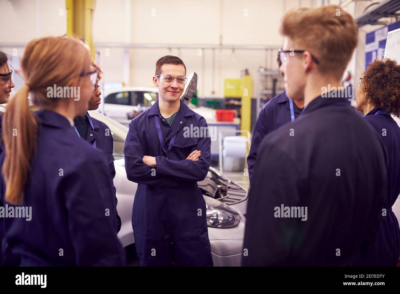 Group Of Students Studying For Auto Mechanic Apprenticeship At College ...