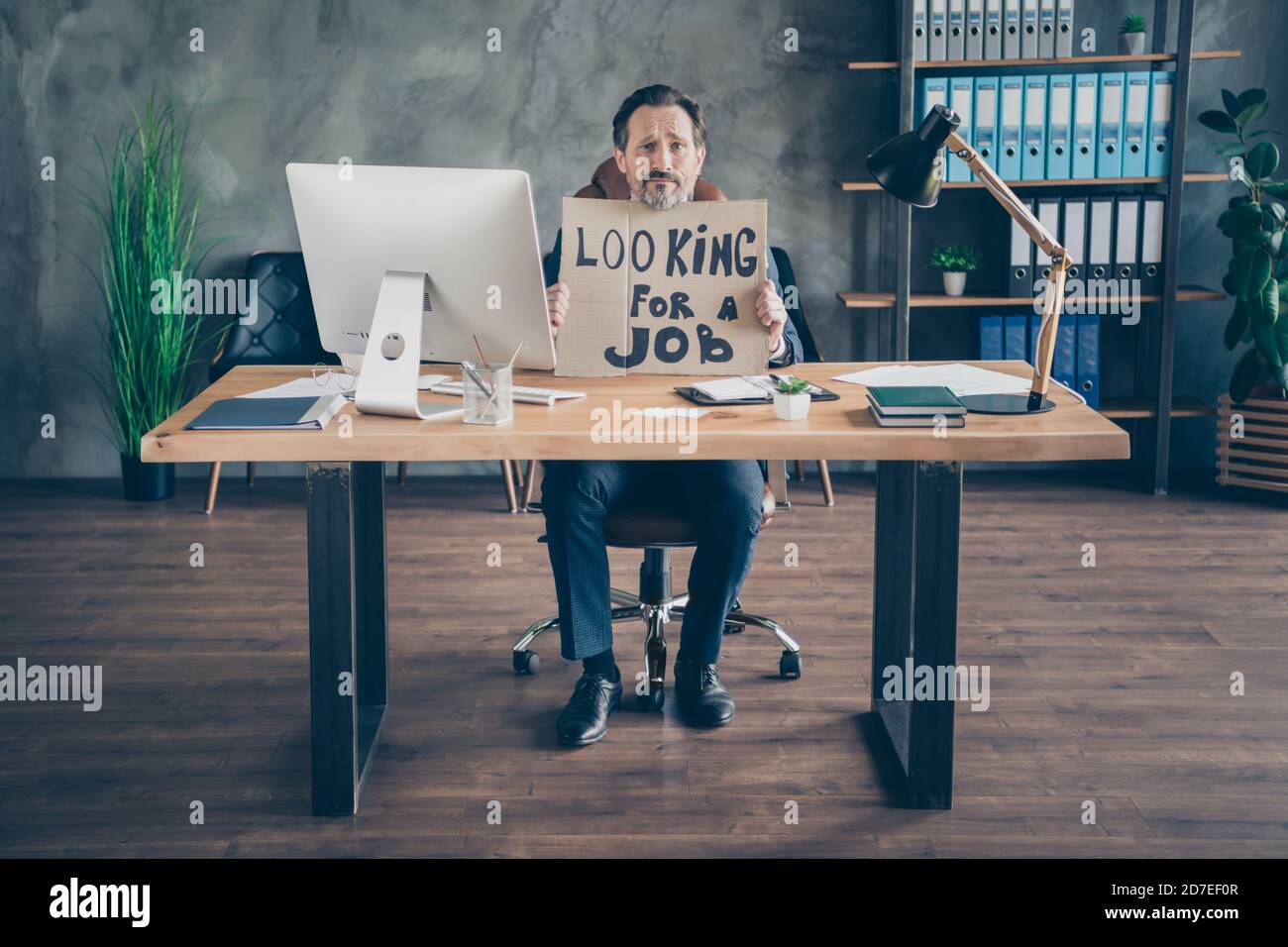 Desperate young man pleading with hands hi-res stock photography and ...
