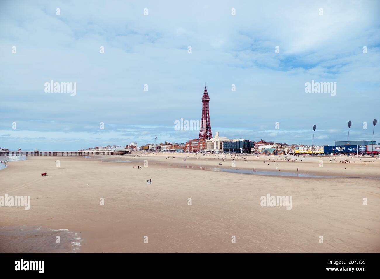 Blackpool beach, tower and landscape showing socially distant tourists ...
