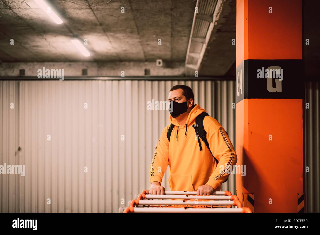 Man in hoodie shopping hi-res stock photography and images - Alamy