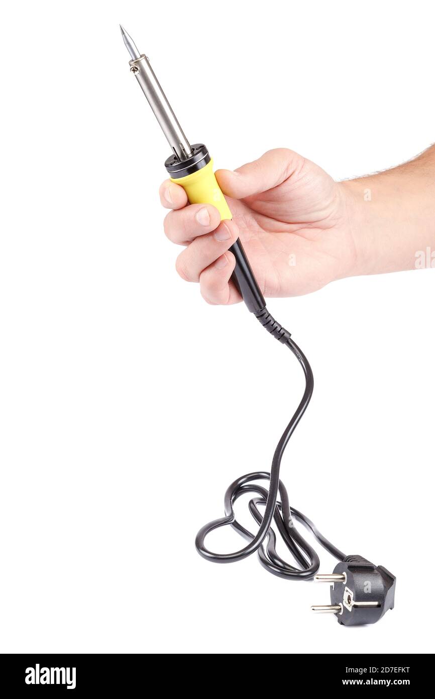 A soldering iron in a hand isolated on a white background Stock Photo ...