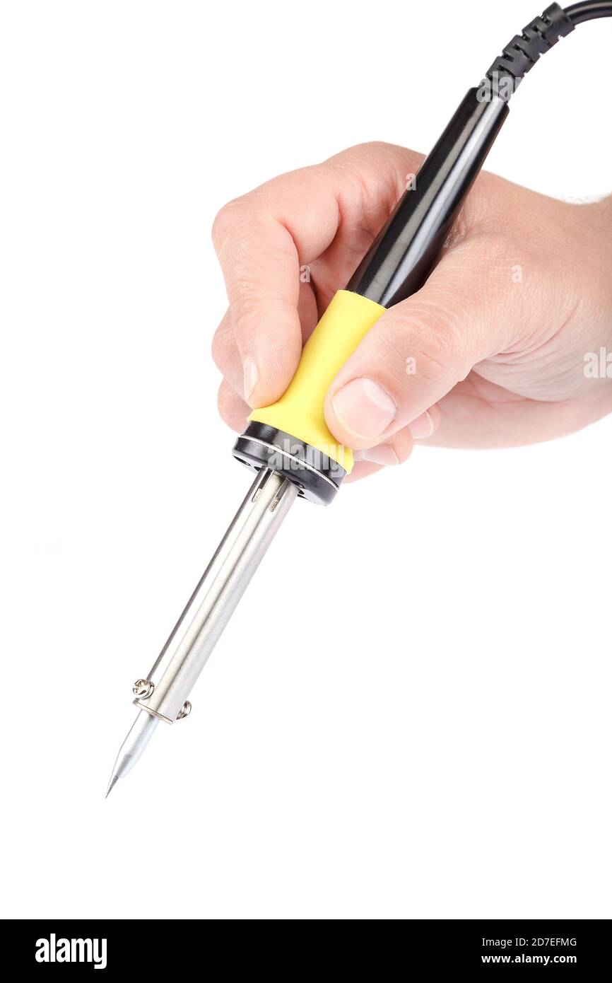 A soldering iron in a hand isolated on a white background Stock Photo ...