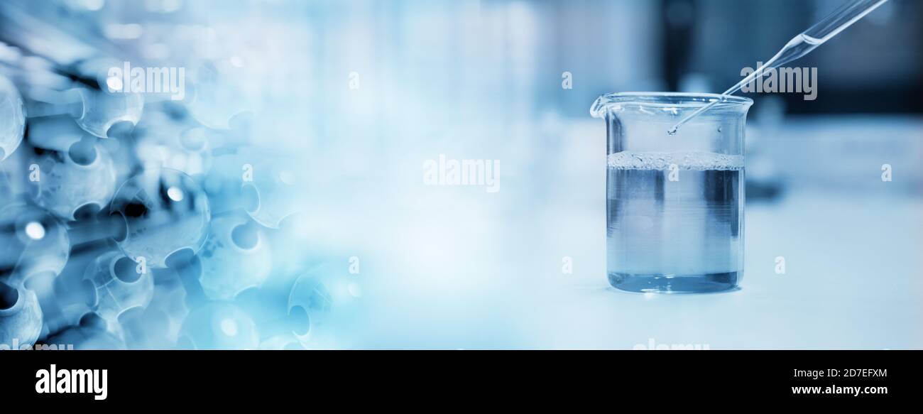 glass dropper with water drop in beaker with molecular structure ...