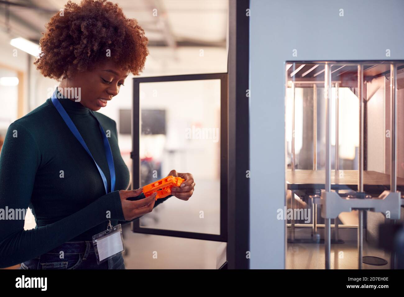 Female College Student Studying Engineering Using 3D Printing Machine ...